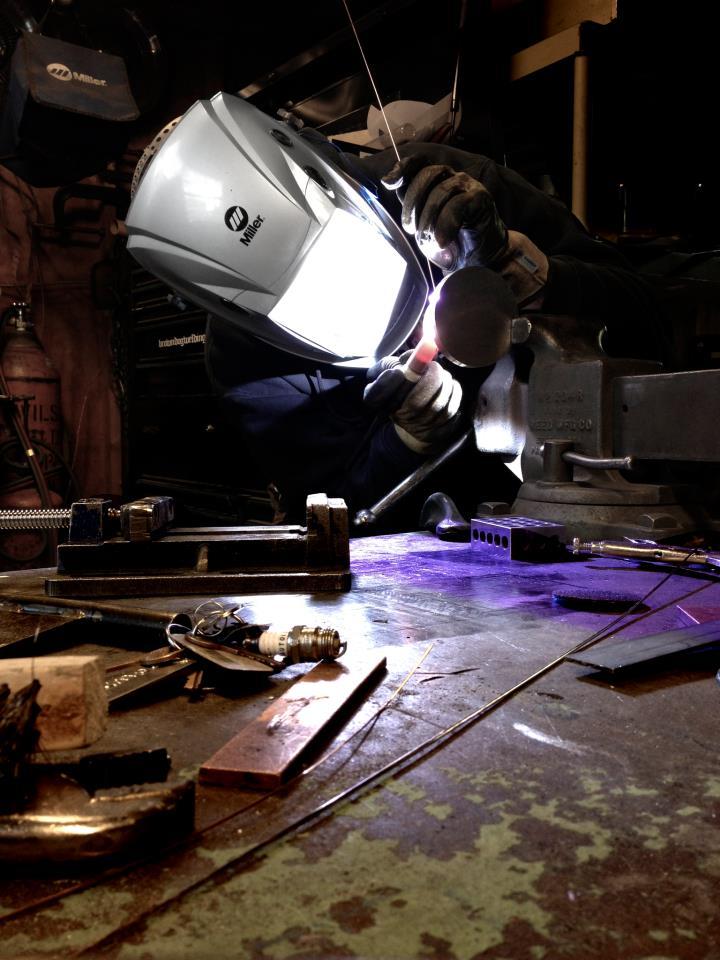 A welder’s hands and eyes