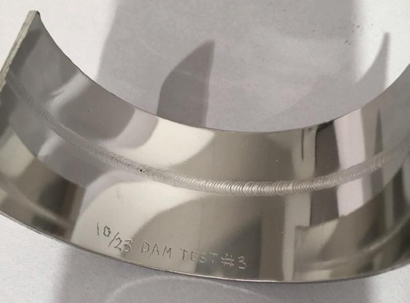 Using a purge dam to cut welding time for UHP applications